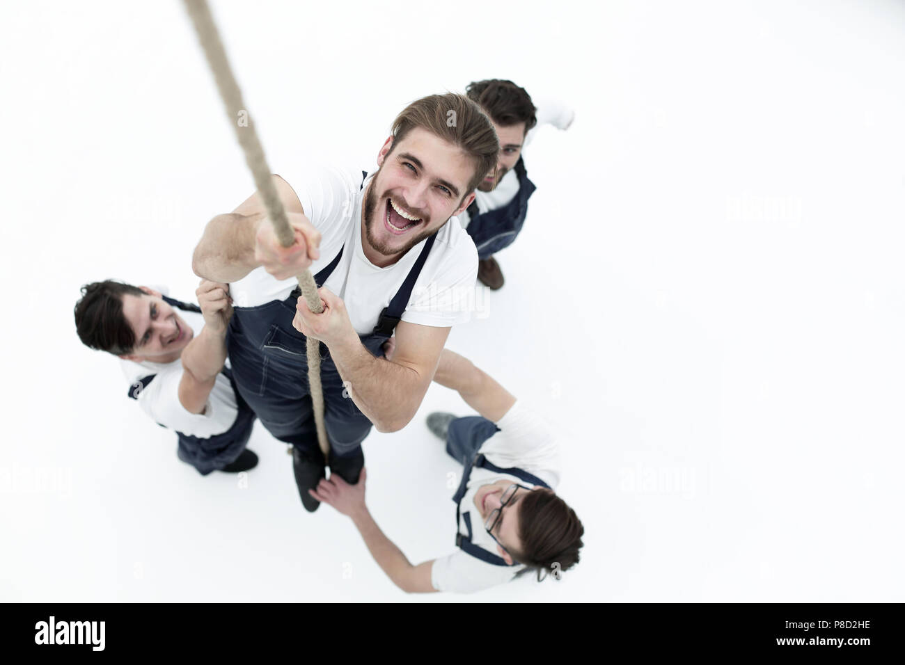 view from the top.construction worker climbing on a rope Stock Photo ...