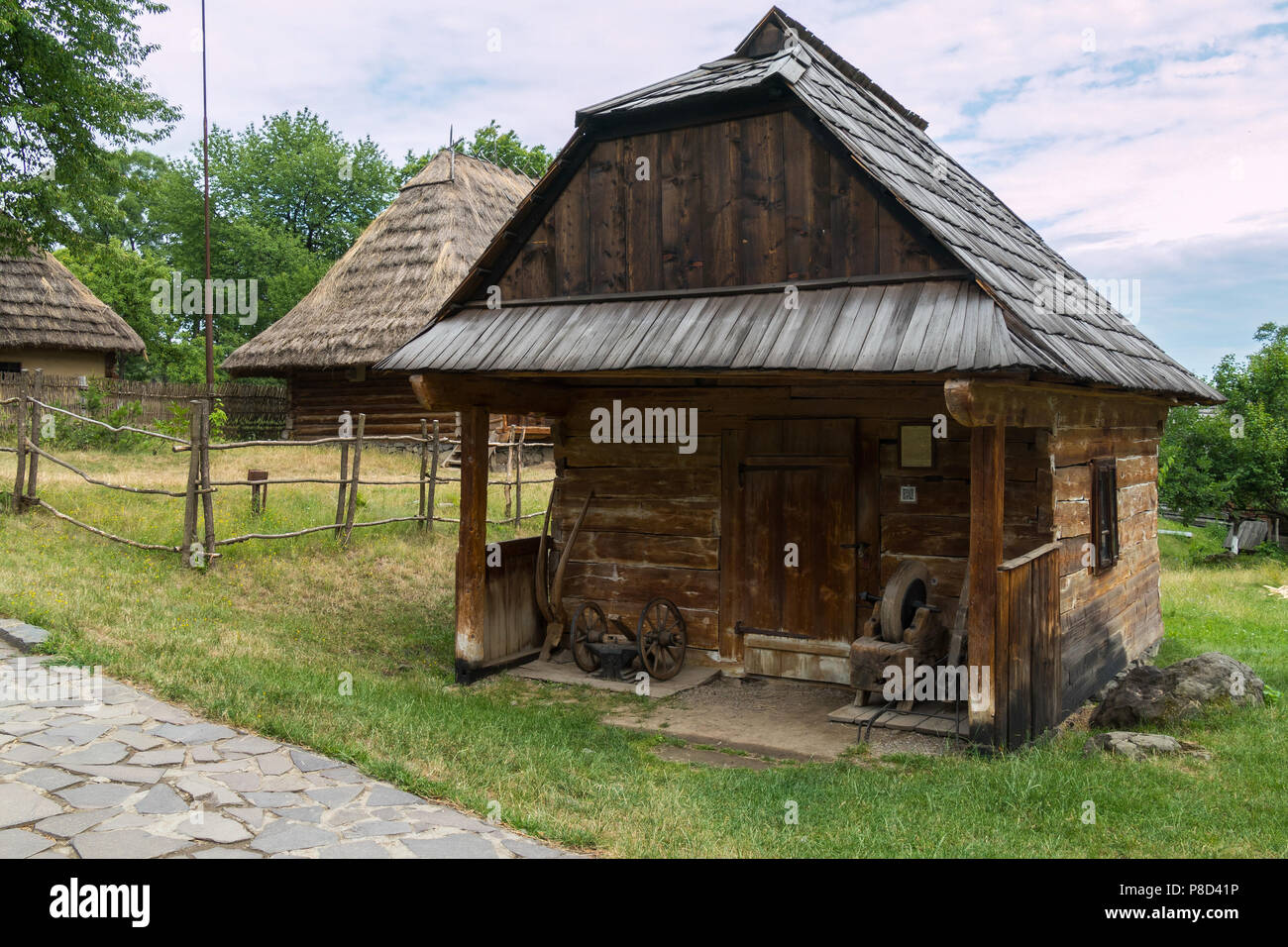 Wooden house with ancient tools of rural people . For your design Stock ...