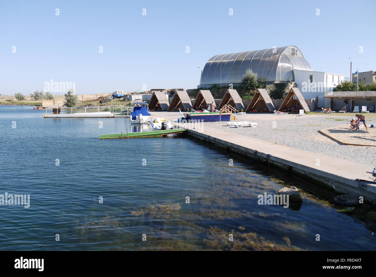 Quay of a small beach with a canopy for rest . For your design Stock ...