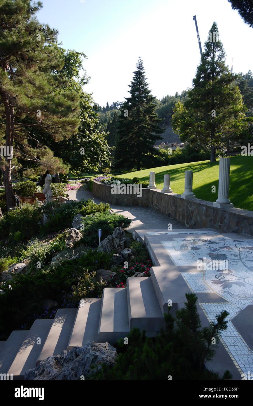 Steps leading to the promenade along the wide green park zone . For ...