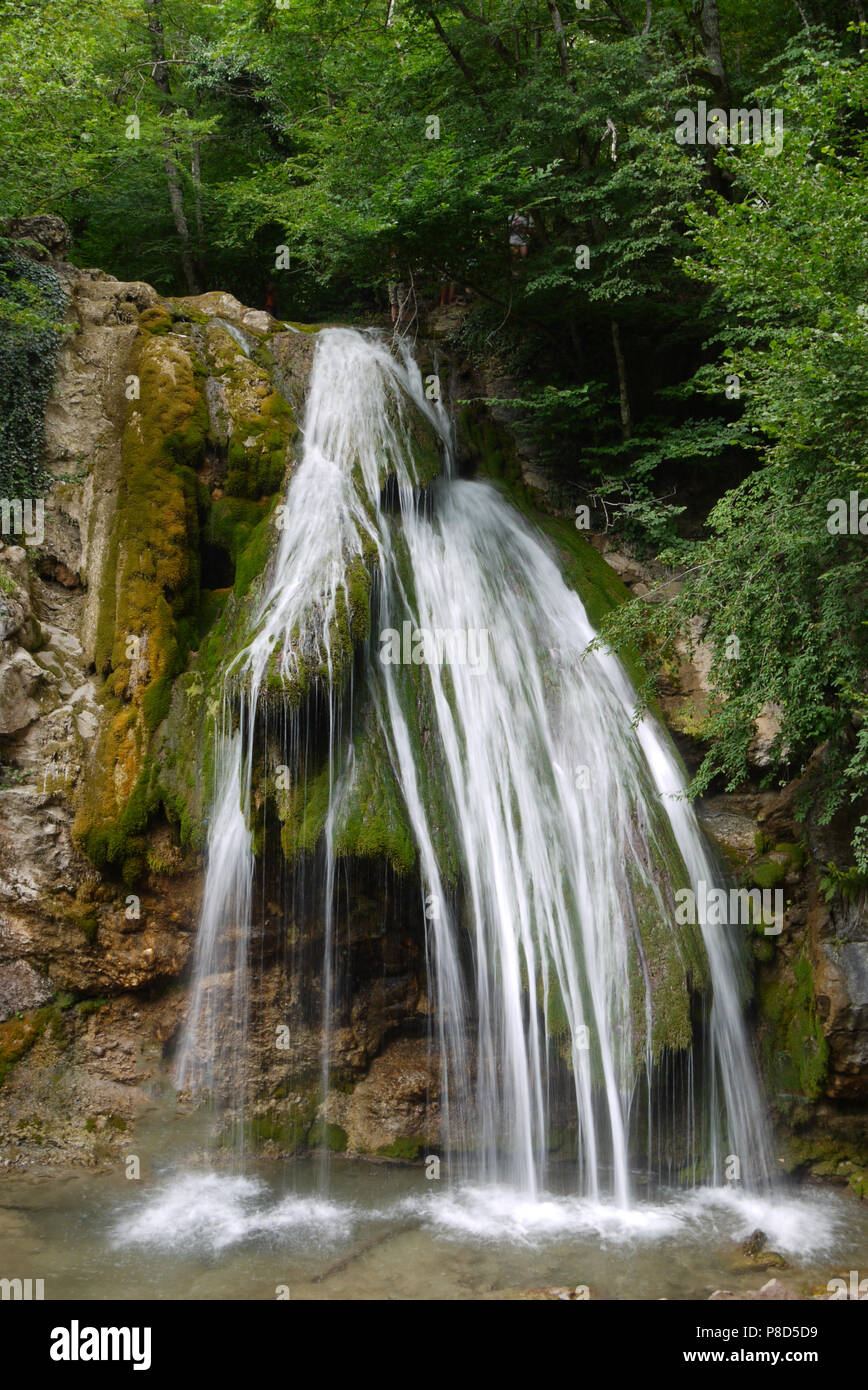 Beautiful scenic big waterfall against the backdrop of stone rock and ...
