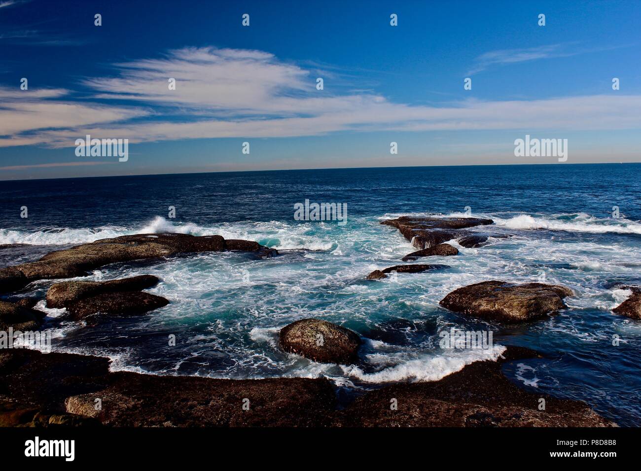 Waves Slowly Crashing Over Rocks In Bondi,Sydney Stock Photo - Alamy