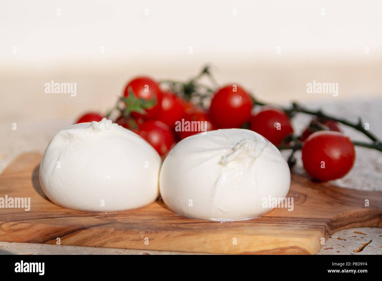 Fresh soft white burrata, buttery cheese, made from a mix of mozzarella ...