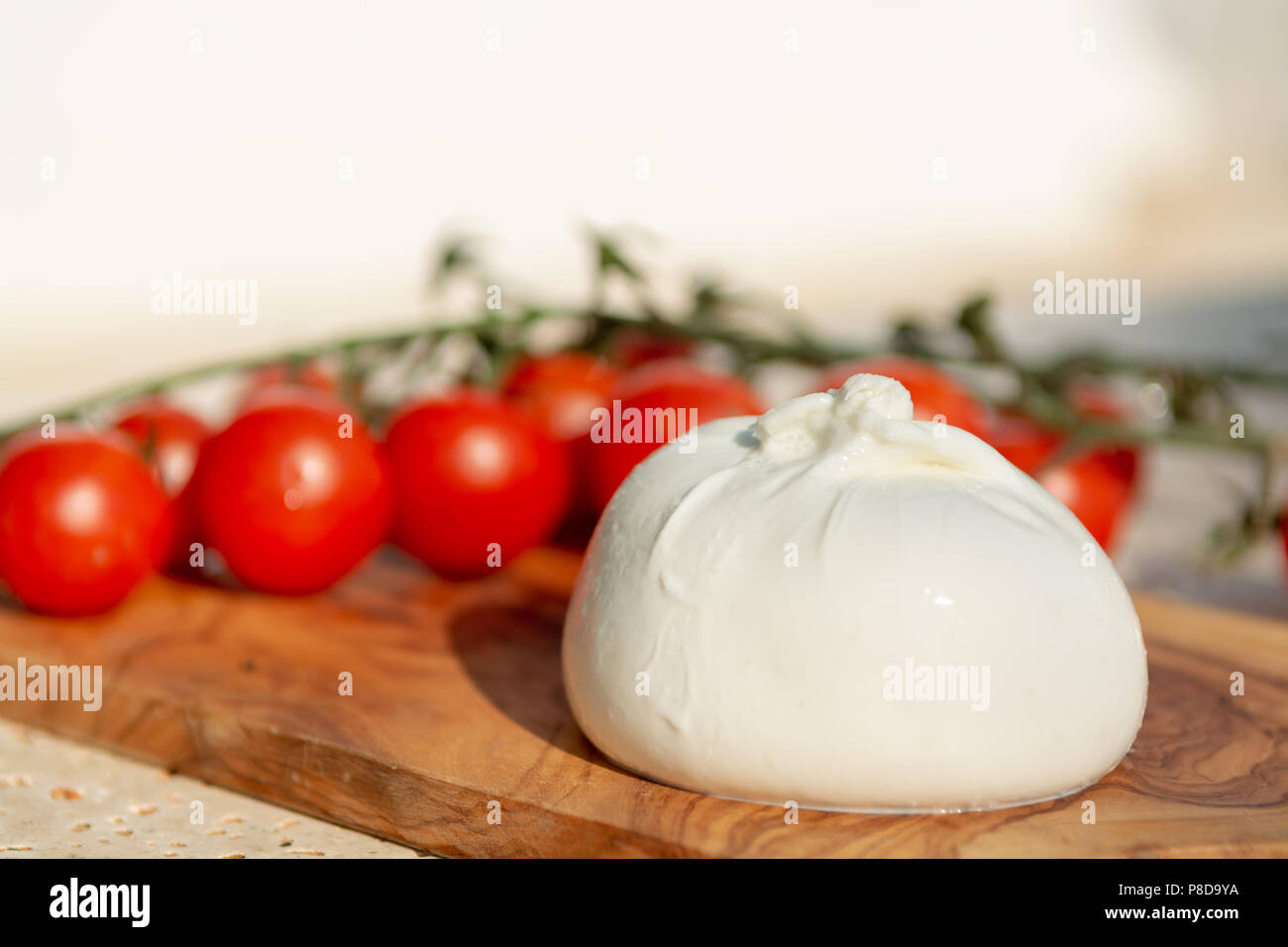 Fresh soft white burrata, buttery cheese, made from a mix of mozzarella ...