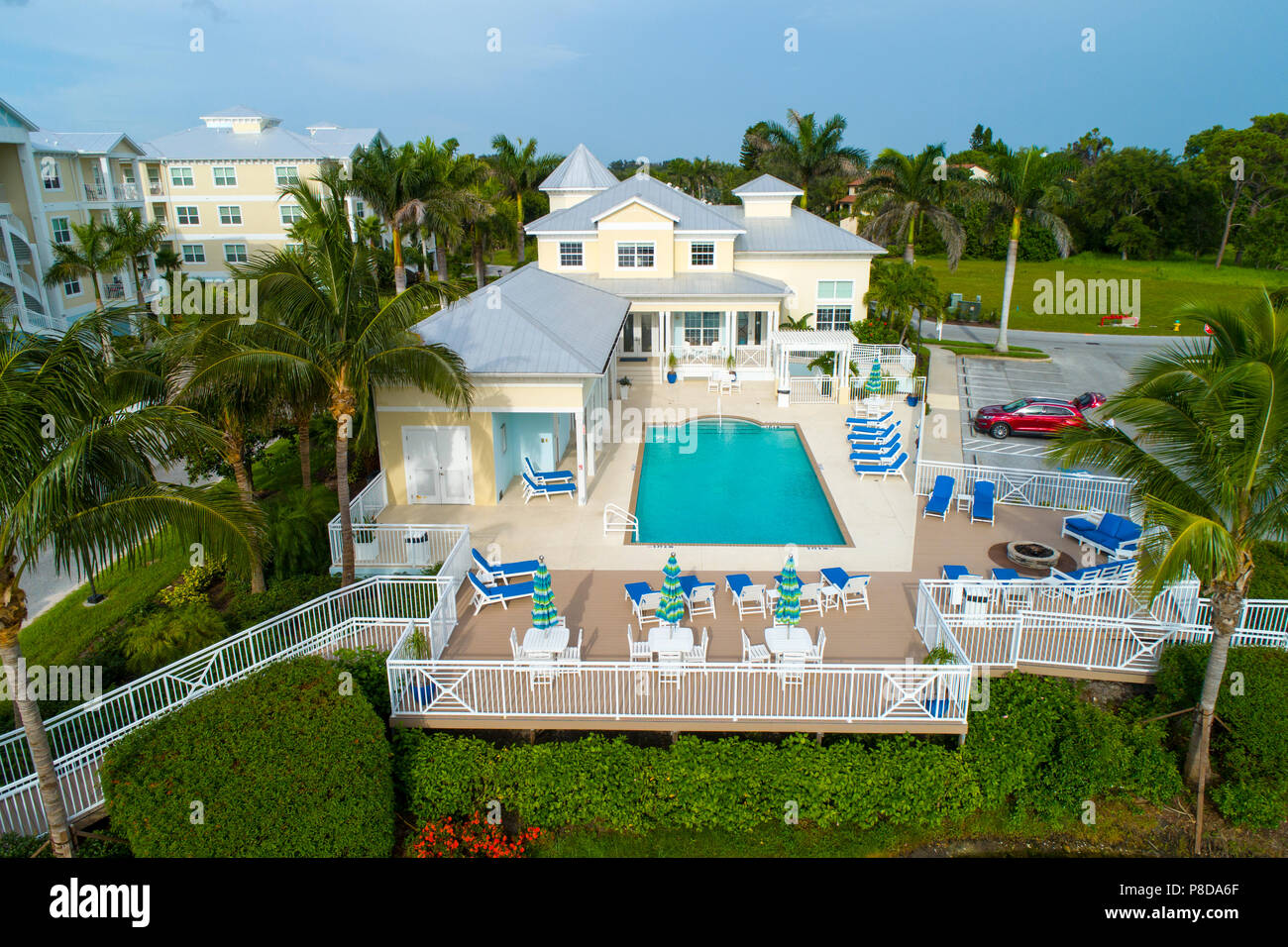 A community swimming pool complete with clubhouse for residents of a ...