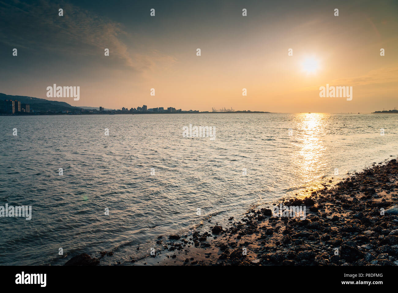 Tamsui river sunset view in New Taipei City, Taiwan Stock Photo - Alamy