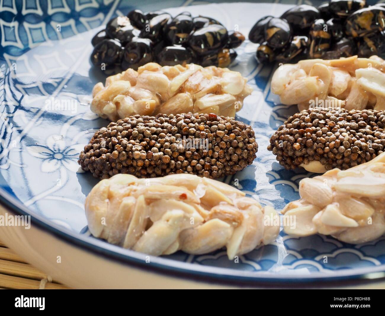 Korean traditional snacks Sweet Rice Puffs , Black sesame gangjeong ...