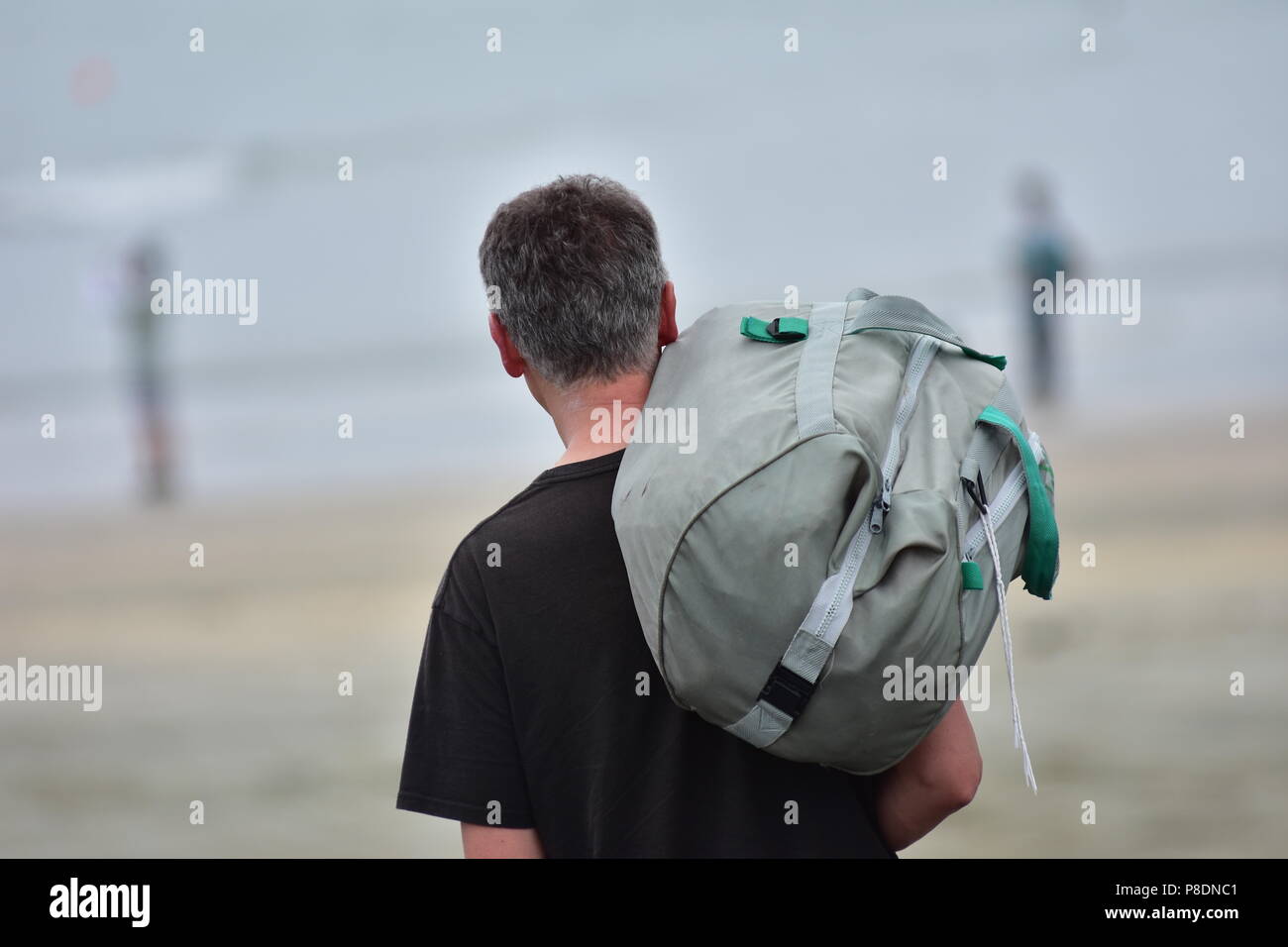 Carrying large bag hi-res stock photography and images - Alamy