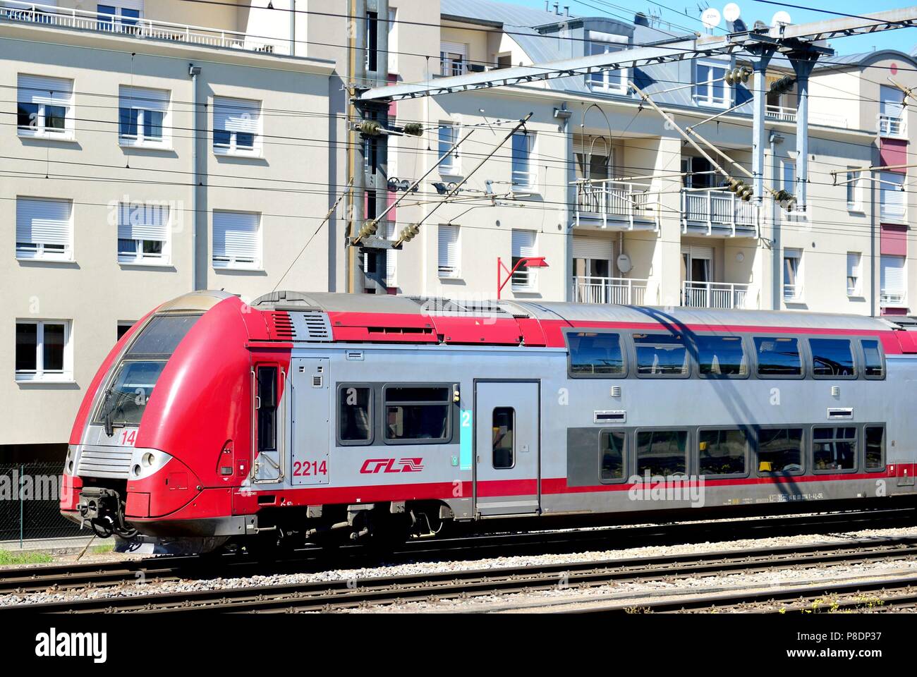 A regional train of CFL in front of houses in Petange (Luxemburg), 06 ...
