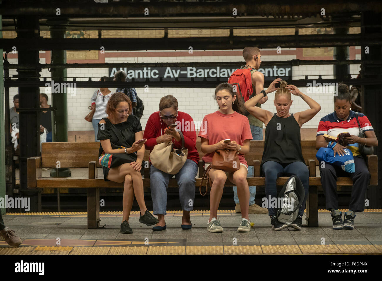 Multiethnic commuters train hi-res stock photography and images - Alamy