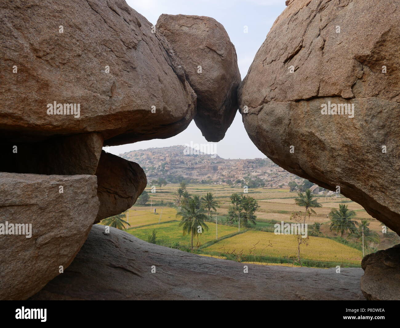 Rice paddies and giant boulders define the unique landscape of Hampi ...