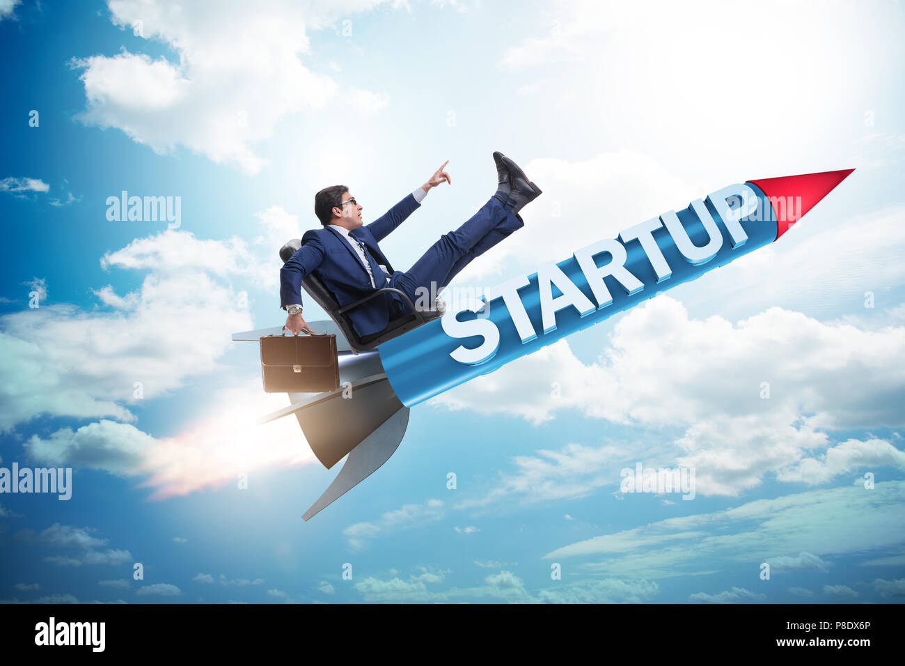 Businessman in start-up concept flying on rocket Stock Photo - Alamy