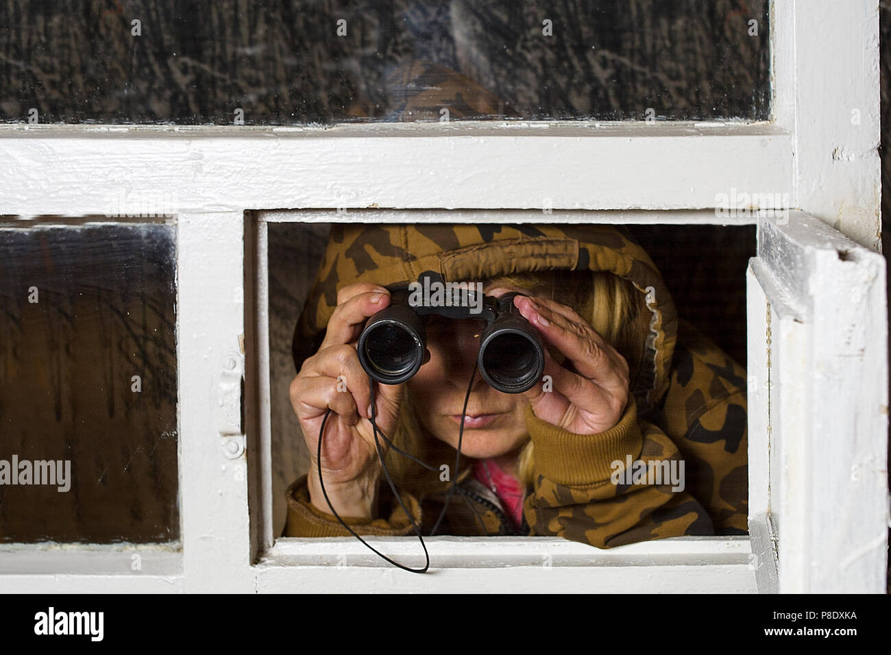 Binoculars by window hi-res stock photography and images - Alamy