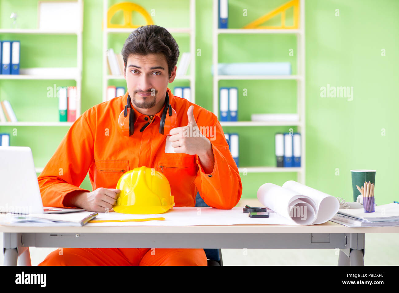 Construction supervisor planning new project in office Stock Photo - Alamy
