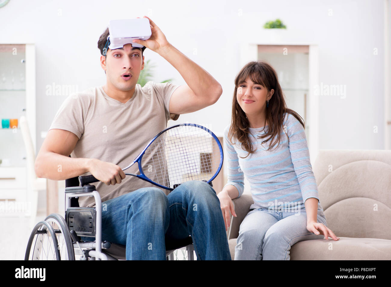 Disabled man with virtual glasses Stock Photo - Alamy