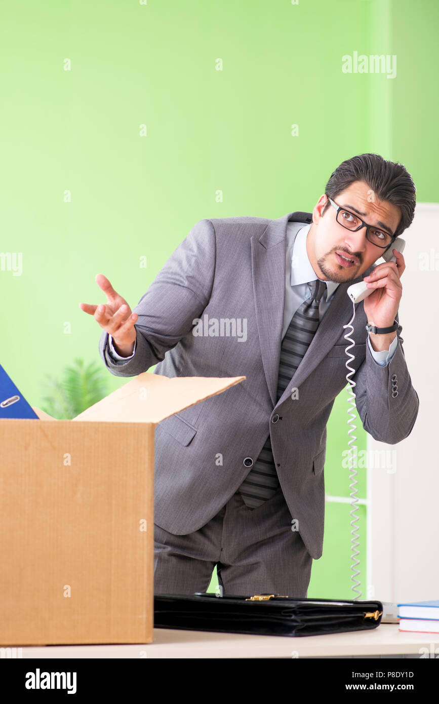 Male employee collecting stuff hi-res stock photography and images - Alamy