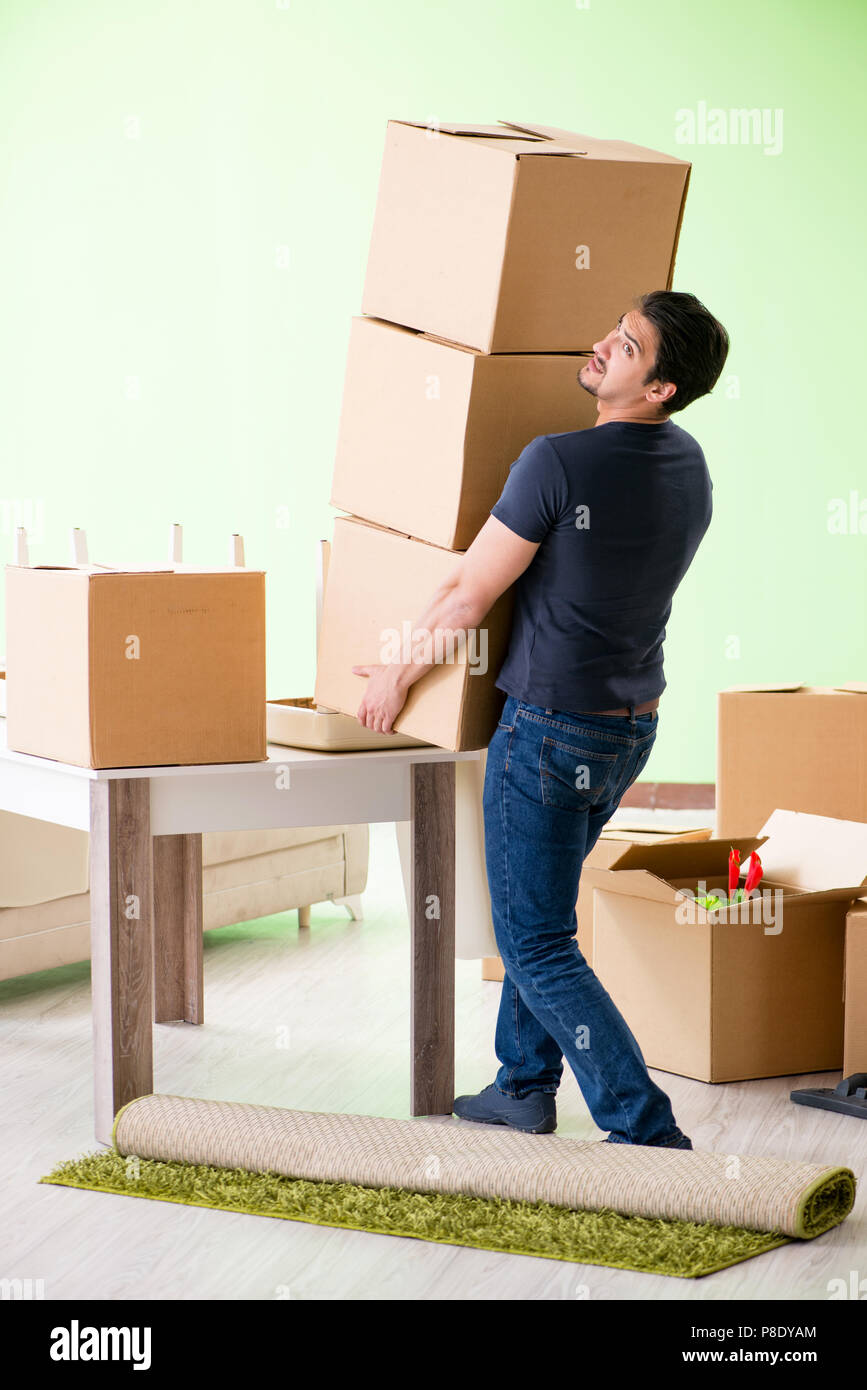 Delivery man falling stack boxes hi-res stock photography and images ...