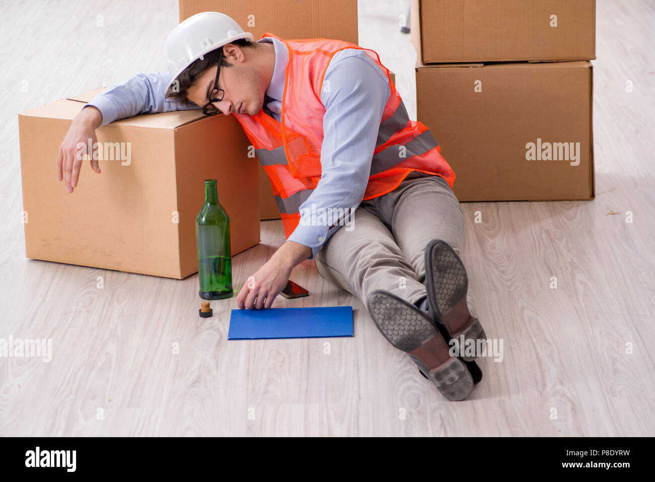 Delivery man drunk at work Stock Photo - Alamy
