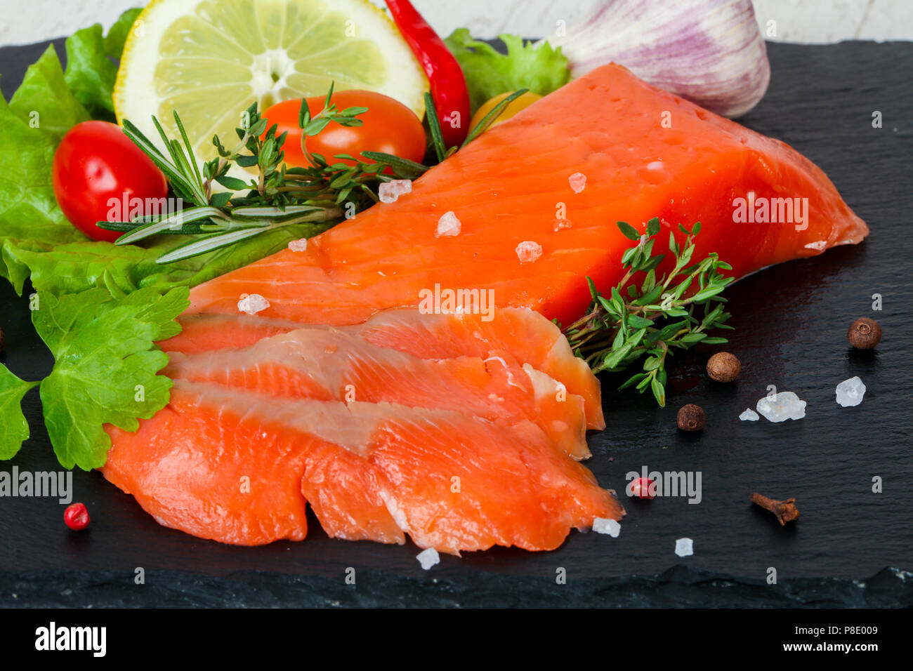 Raw trout fillet with salt and spices Stock Photo - Alamy