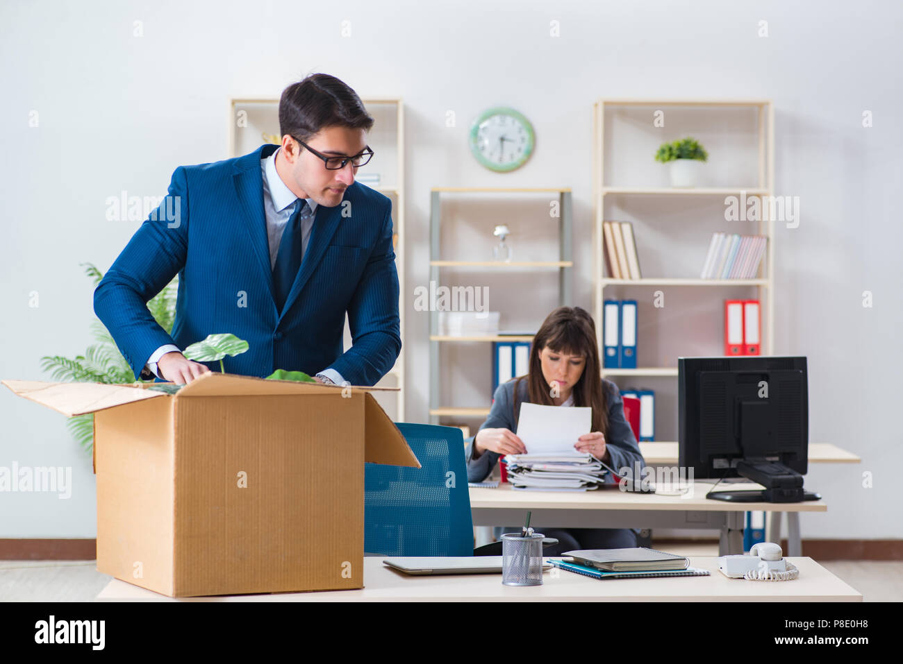 Person being fired from his work Stock Photo - Alamy