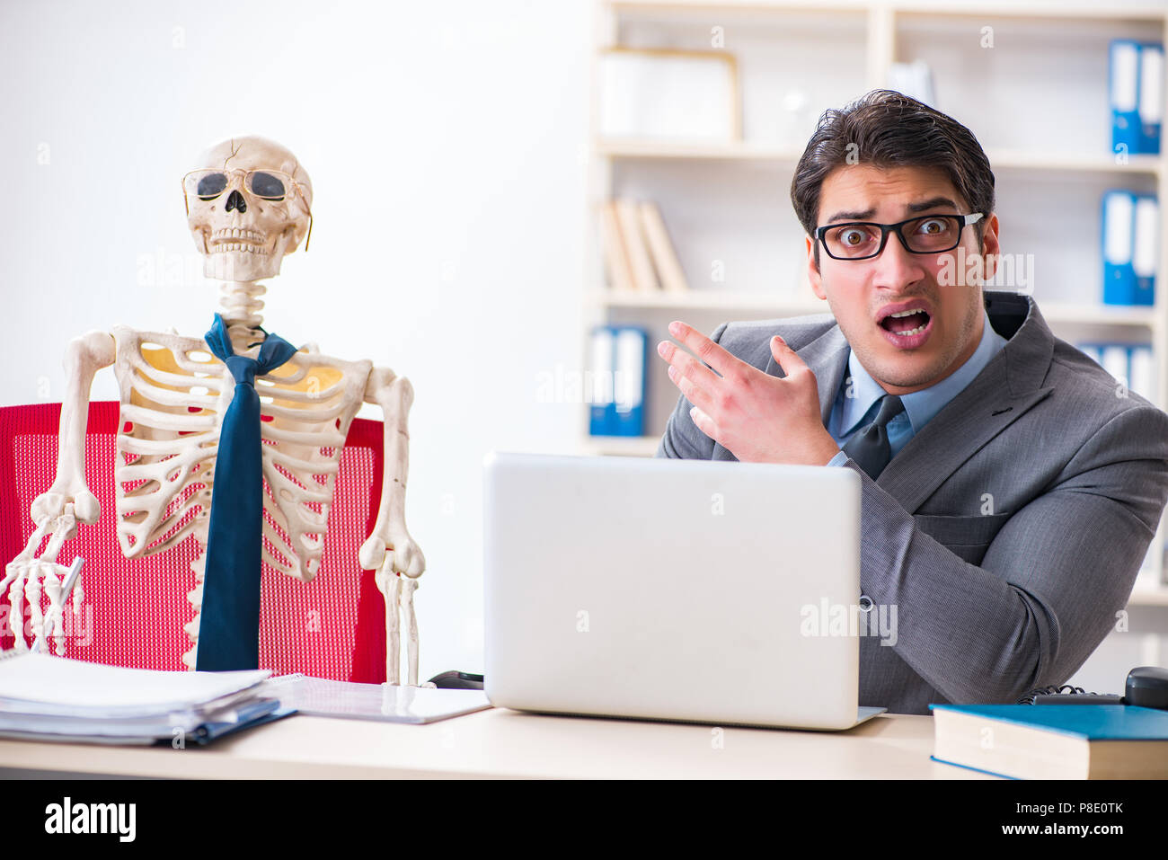 Dead office worker skeleton hi-res stock photography and images - Alamy