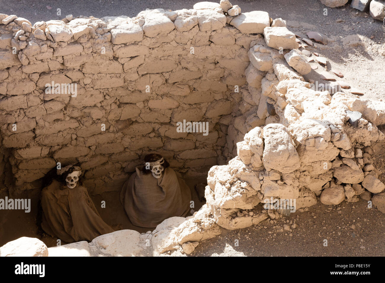 Bones in open inca cemetery in Nazca region , Peru Stock Photo - Alamy