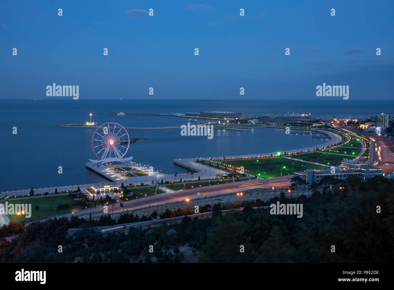 The Ferris wheel and Crystal Hall seen from Dagustu Park at dusk in ...