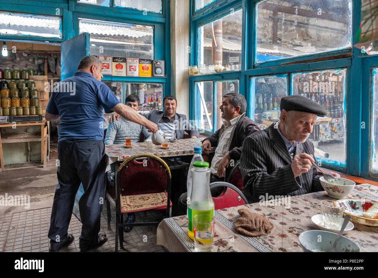 Small restaurant inside the Teze Bazaar, Baku, Azerbaijan Stock Photo ...