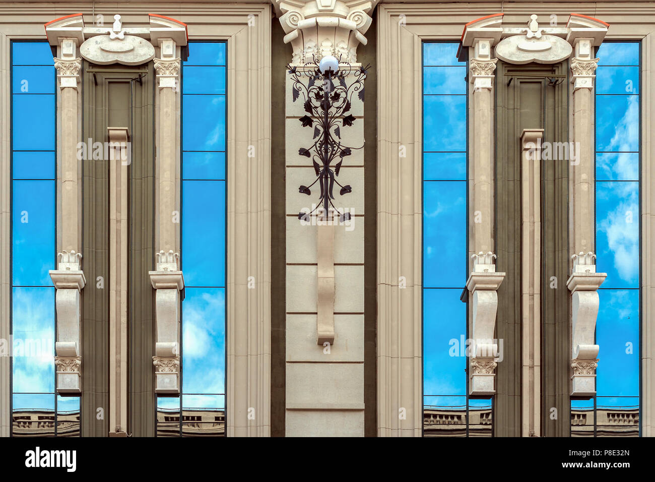 Urban architecture. Architectural detailes.Vertical mirrored windows of ...