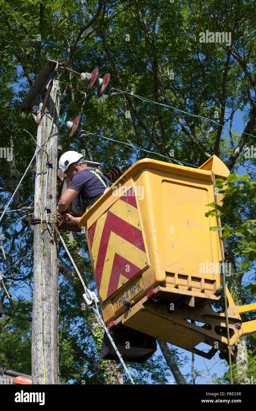 Engineer replacing electricity transformer, Llanllyfni, Gwynedd Stock ...