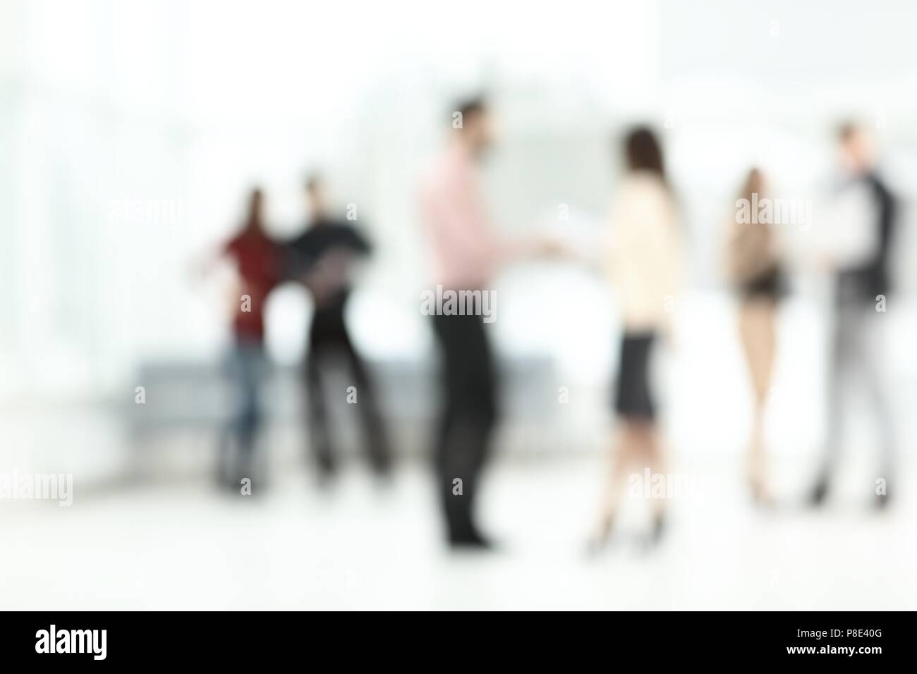 background image of a business team talking in the office hall Stock ...