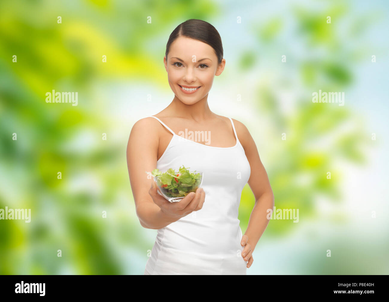 happy slim woman with vegetable salad Stock Photo - Alamy