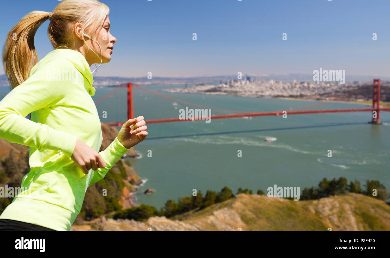 Beautiful woman running over bridge hi-res stock photography and images ...