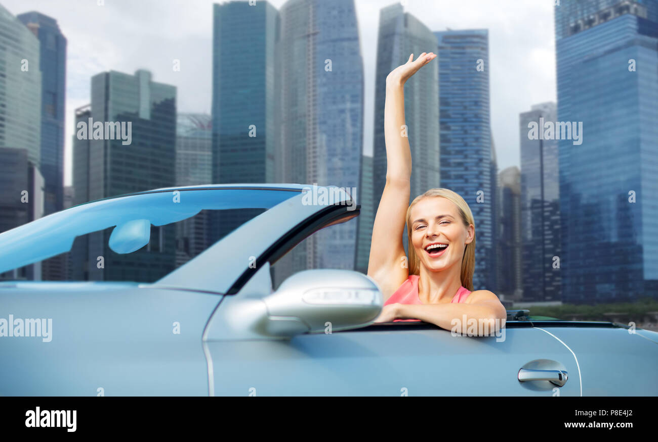 woman in convertible car over singapore city Stock Photo - Alamy