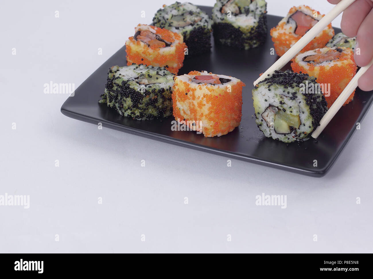 Sushi Set - different types of Maki sushi and chopsticks Stock Photo ...