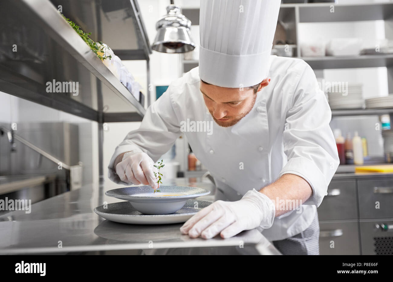 happy male chef cooking food at restaurant kitchen Stock Photo - Alamy