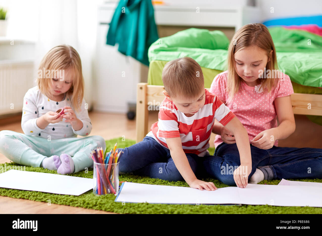 happy creative kids making crafts at home Stock Photo - Alamy