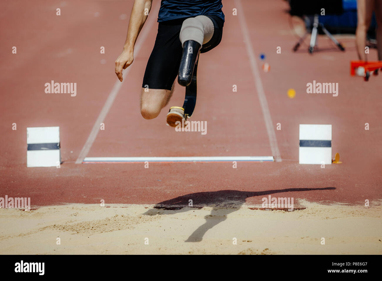 athlete jumper with limb loss leg long jump at track and field ...