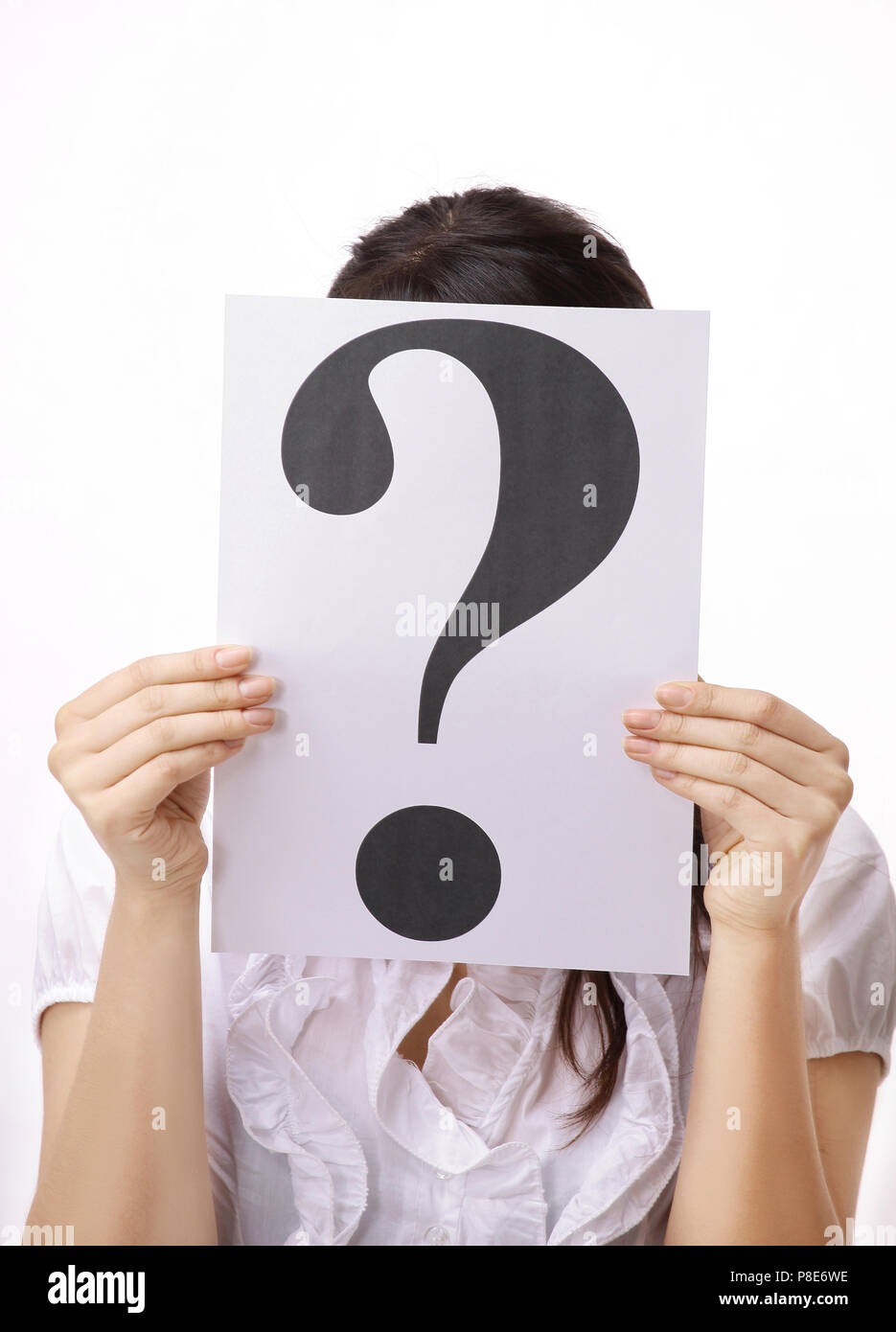 closeup.young woman showing a question mark Stock Photo - Alamy