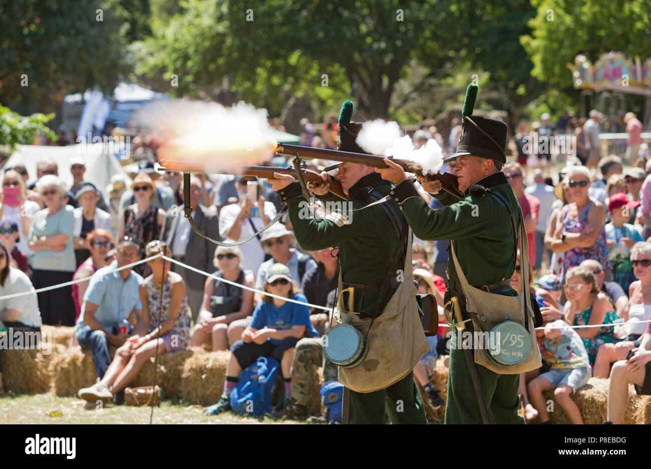 Muzzle flash from a musket during re enactment by the 1st, 95th Rifles ...