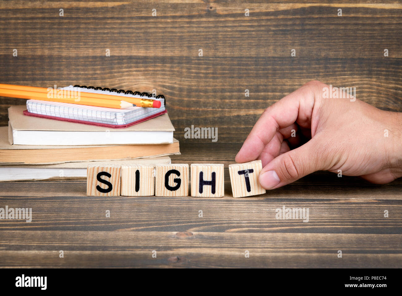 Sight. Wooden letters on the office desk Stock Photo - Alamy