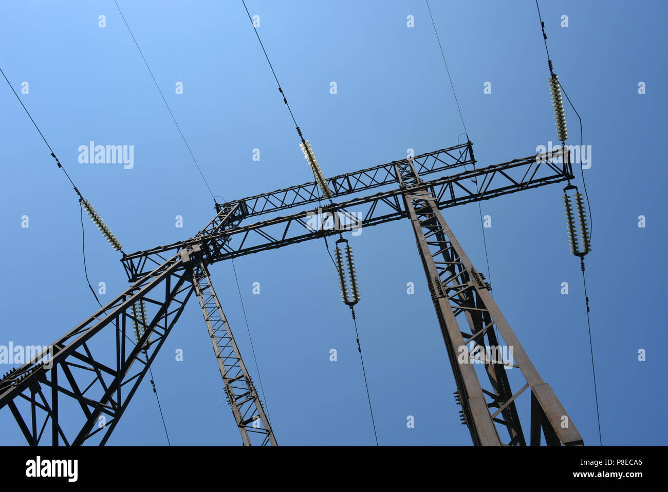 Blue sky with black electrical wires, city electricity, power lines ...
