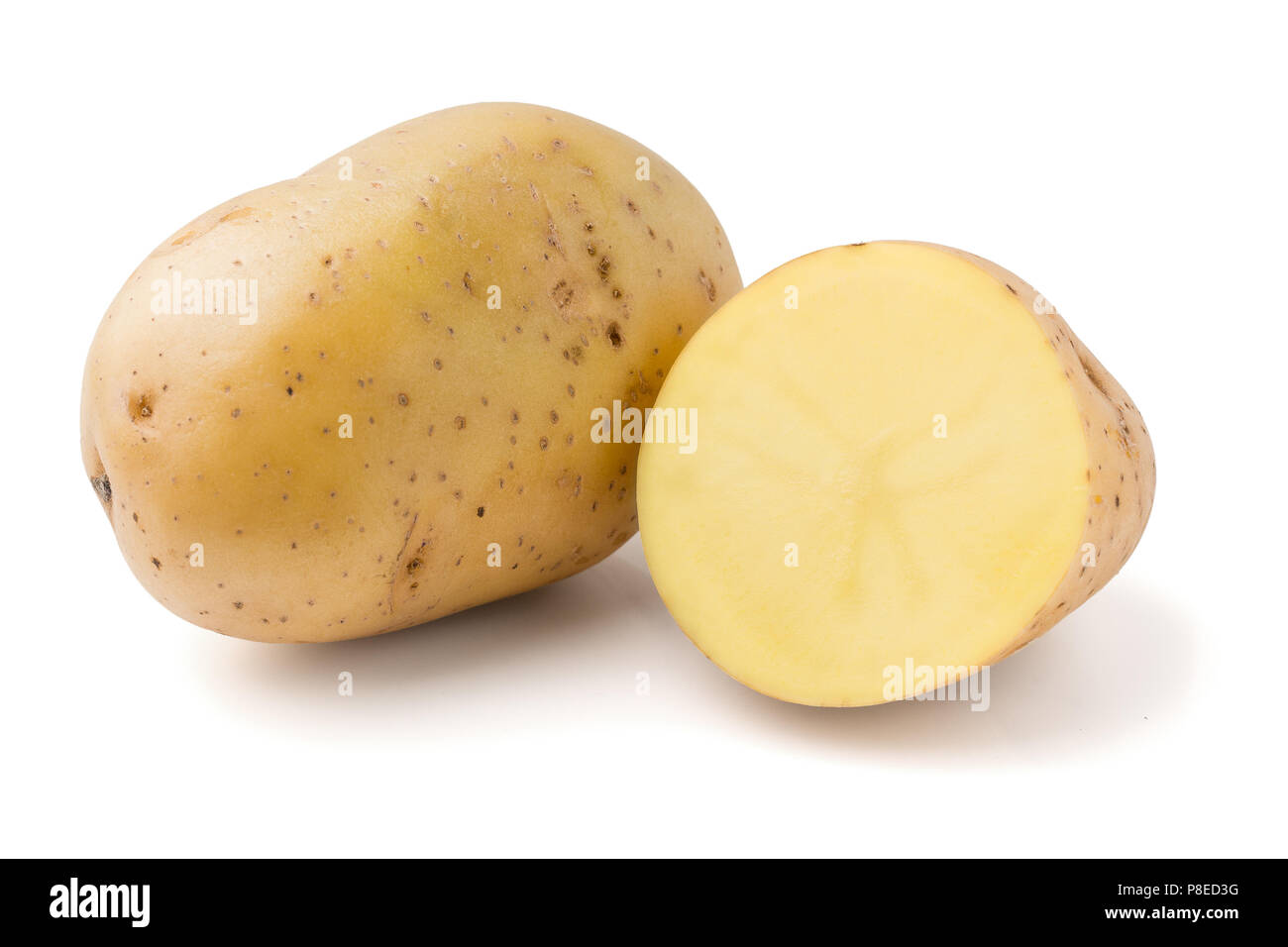 washed potatoes on a white background, isolated Stock Photo - Alamy