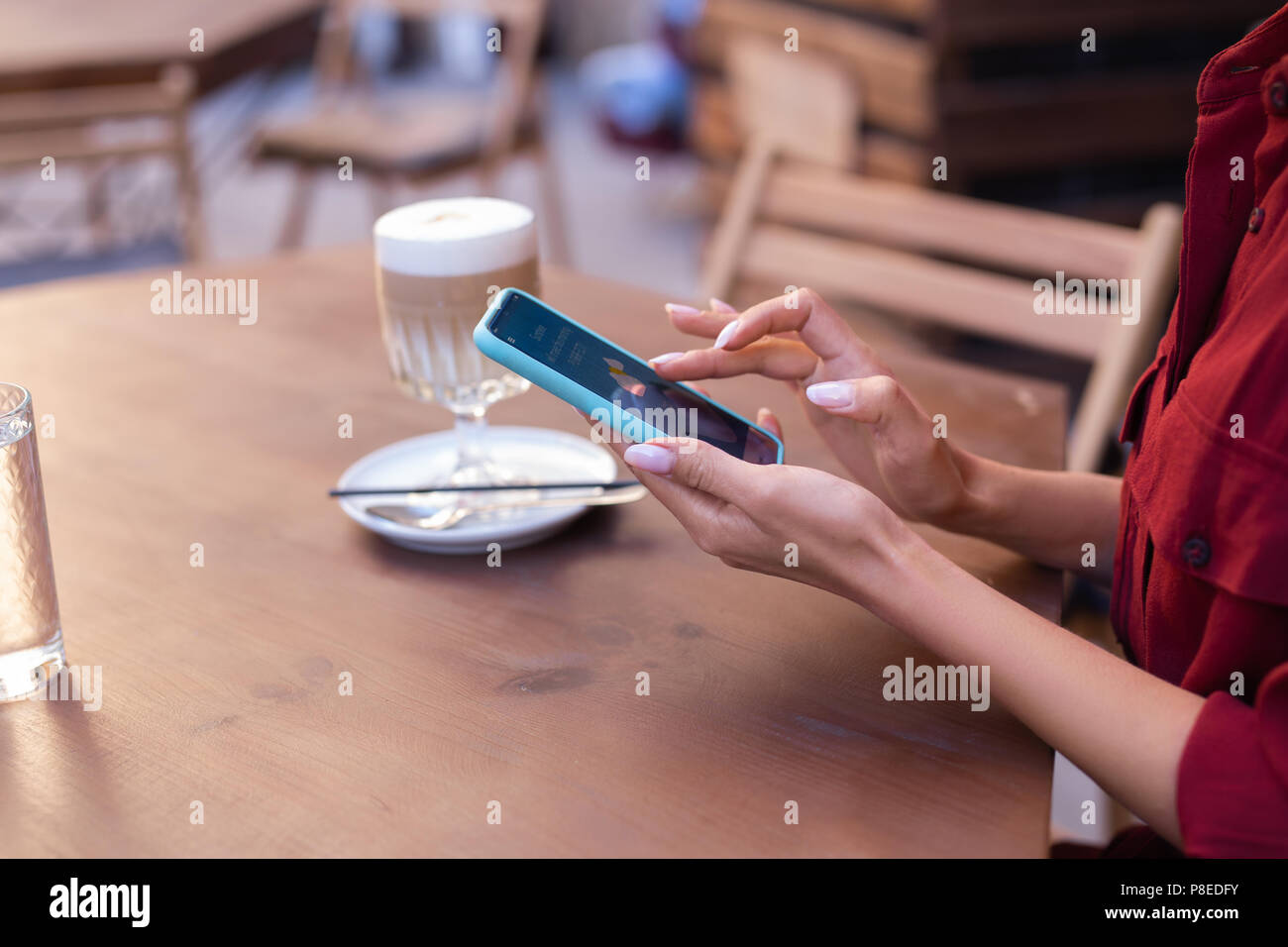 Woman drinking latte having lunch break from work Stock Photo - Alamy