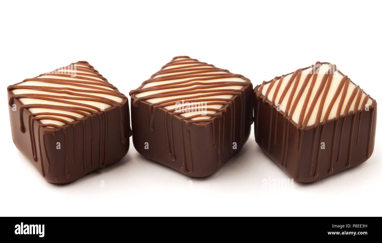 Group of chocolate sweets on a white background, isolated Stock Photo ...