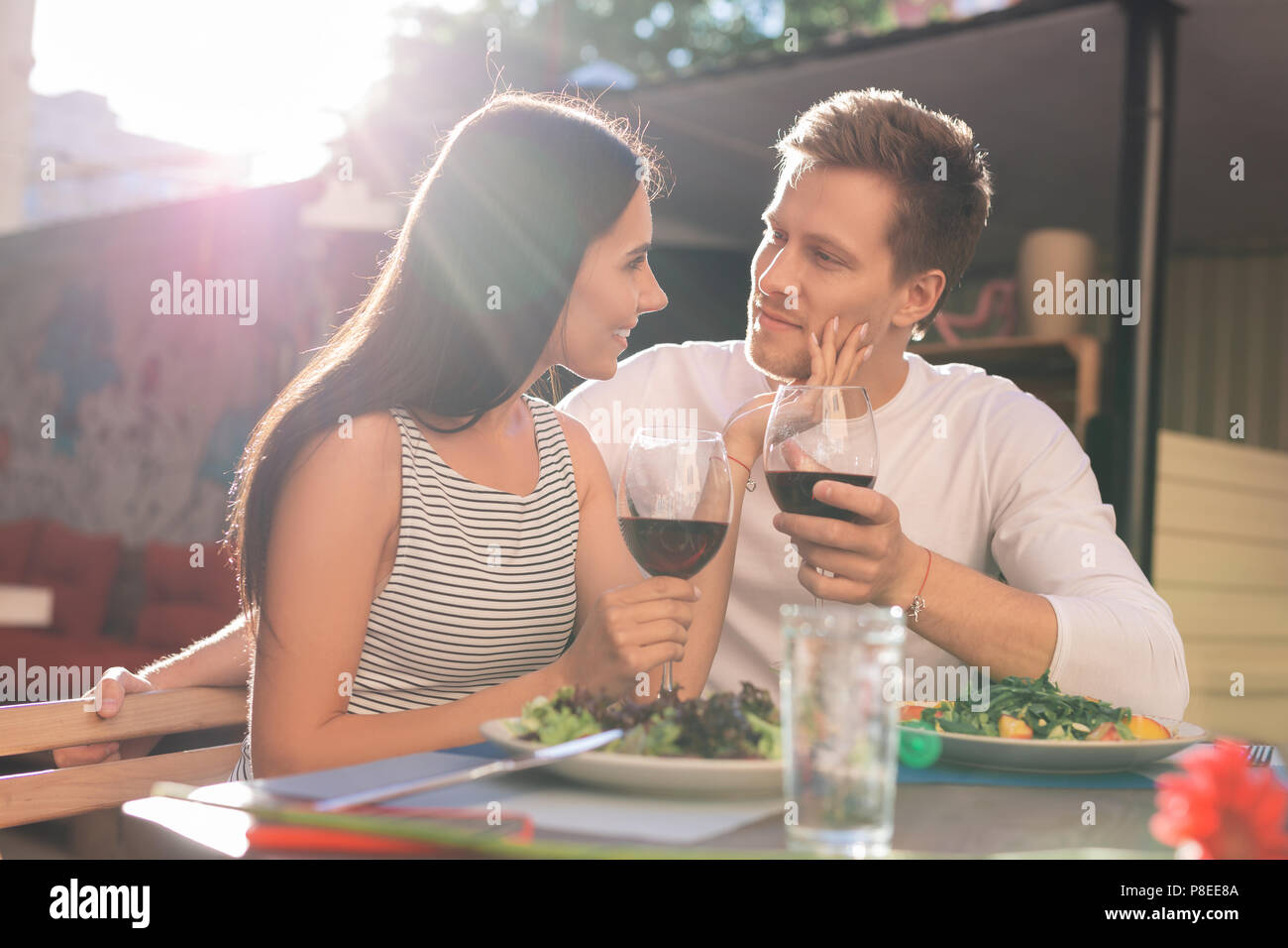 Young couple celebrating their relationship anniversary Stock Photo - Alamy