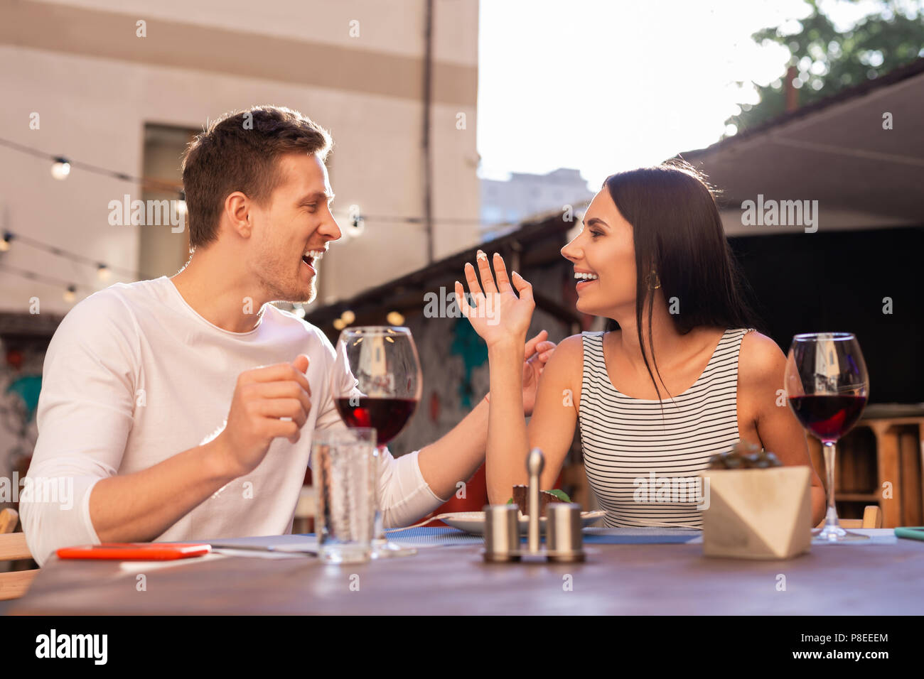 Blonde-haired man interacting his beautiful girlfriend Stock Photo - Alamy