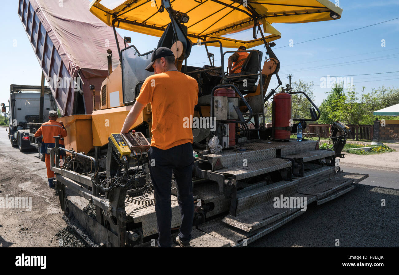 Asphalt placing machine hi-res stock photography and images - Alamy