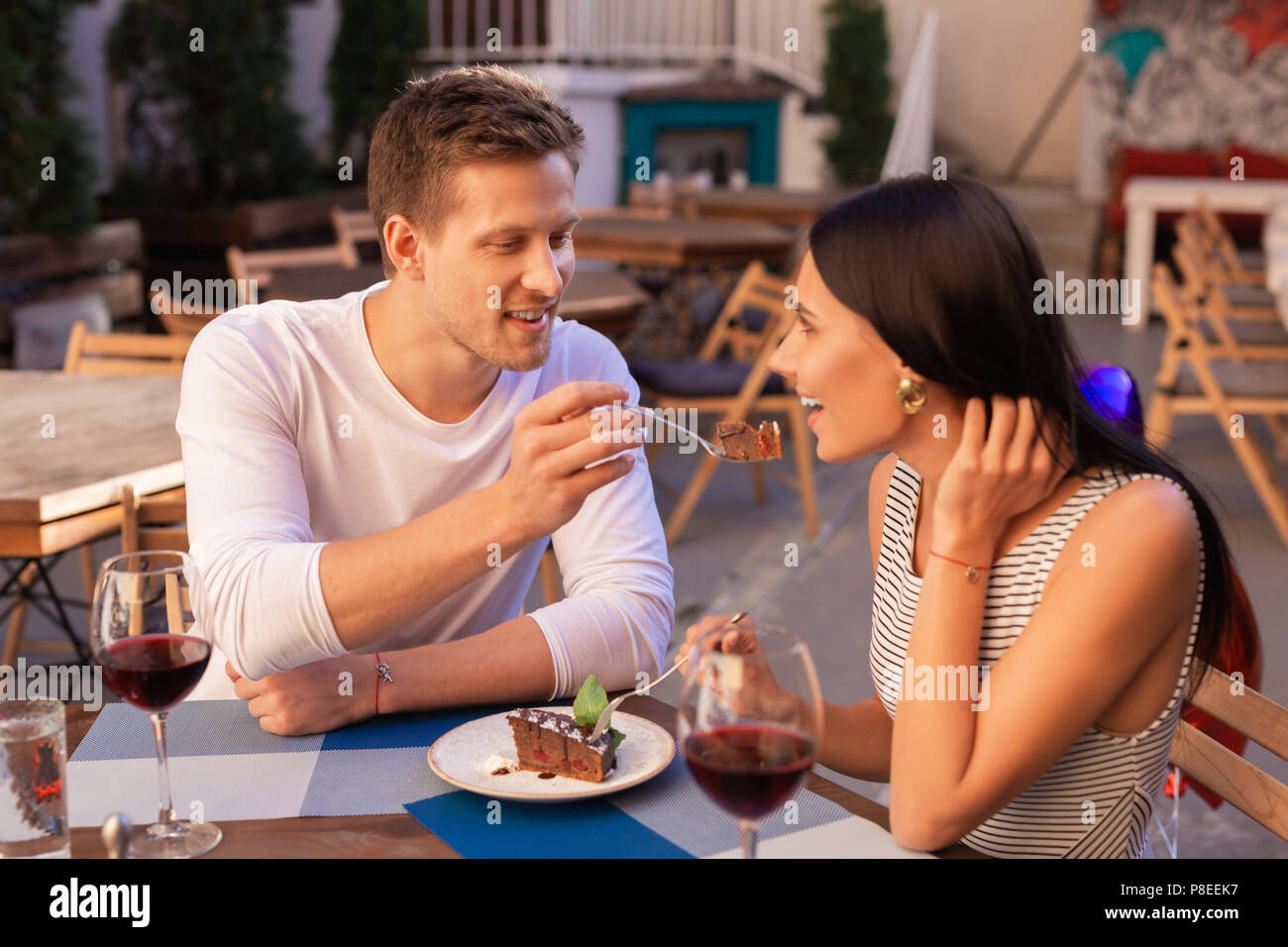 Man giving girlfriend cake hi-res stock photography and images - Alamy