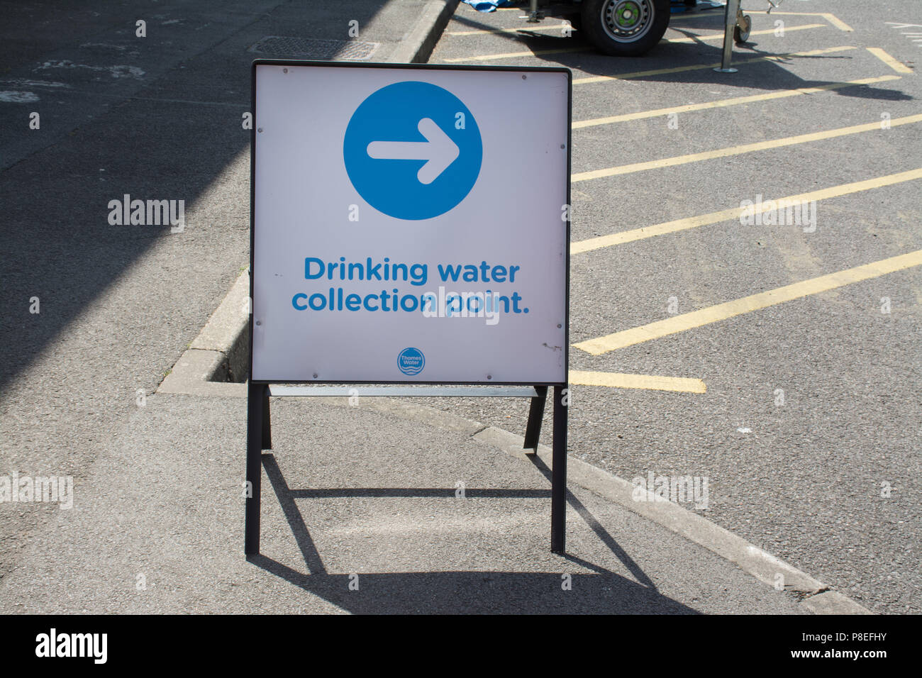 Signs to a drinking water collection point set up by Thameswater ...